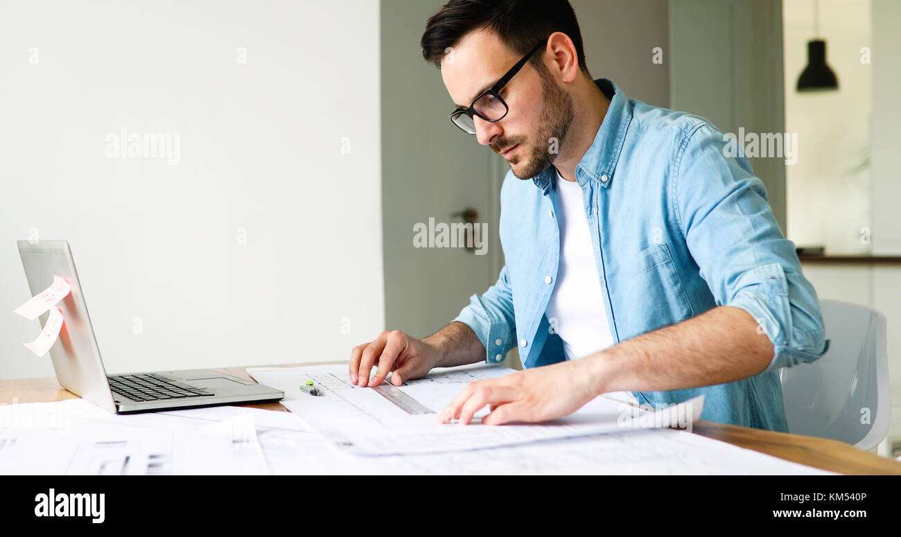 Architect desk plans building hi-res stock photography and images - Alamy