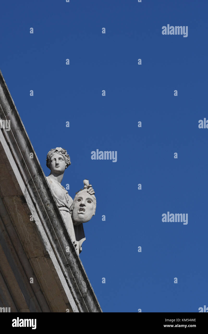 sculpted figure of muse holding face mask;teatro nacional d.maria II ...