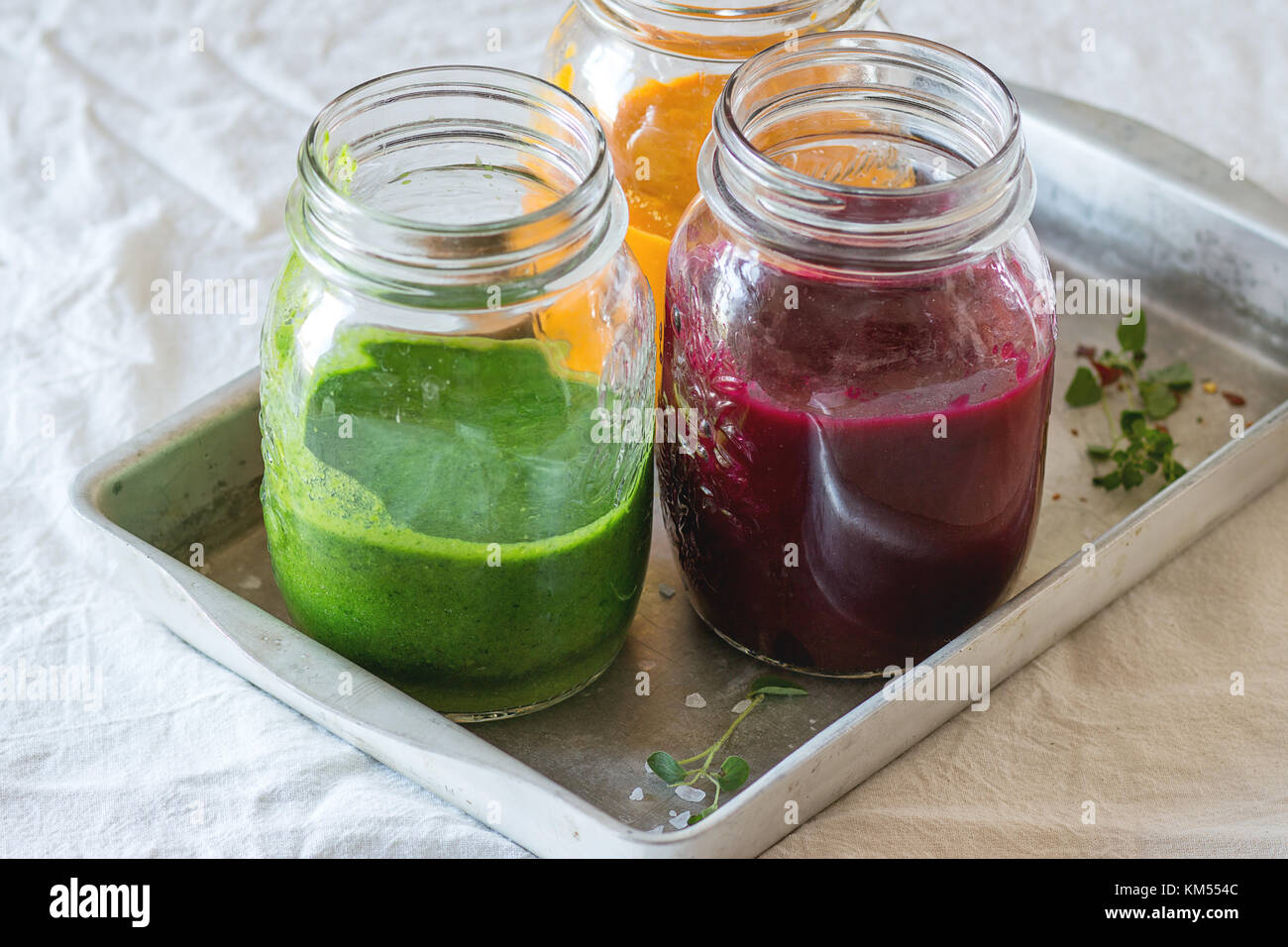Vintage tray with assortment of vegetable smoothies from carrot ...
