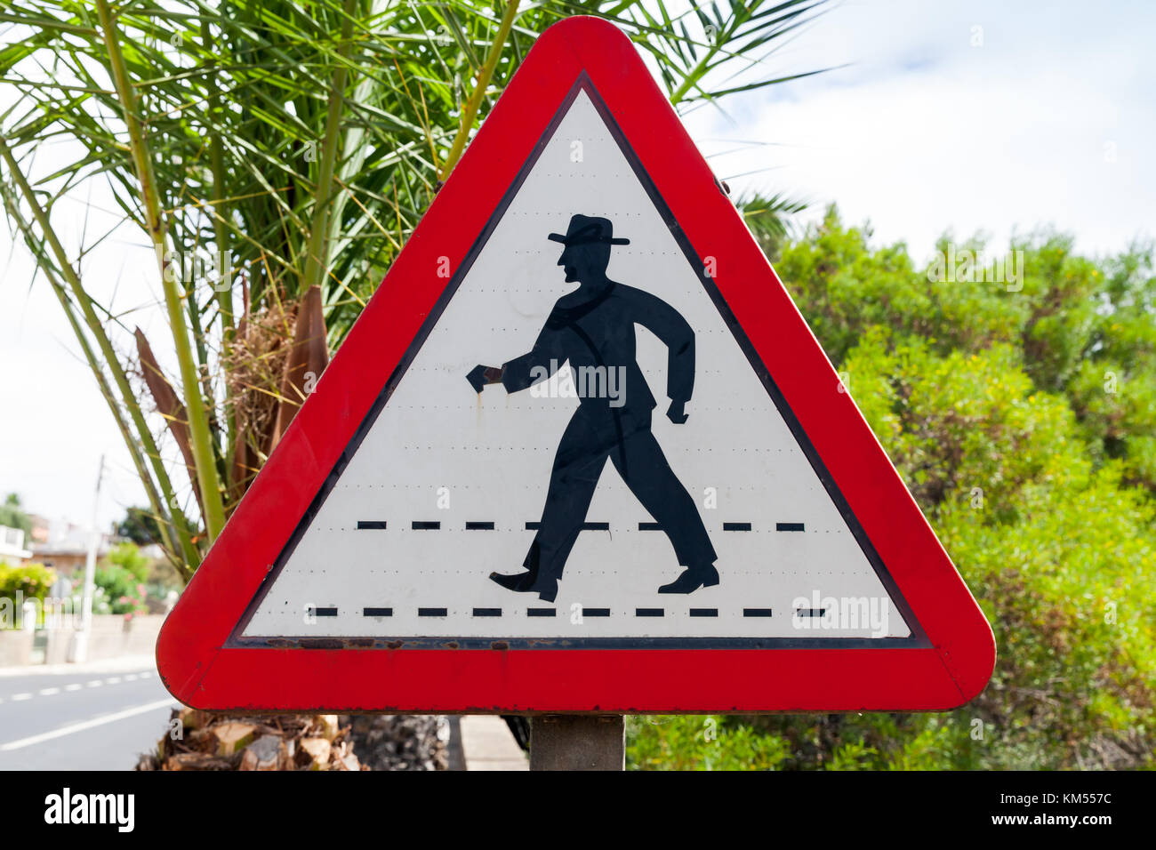 Triangle road sign with schematic walking man in hat, pedestrian zebra ...