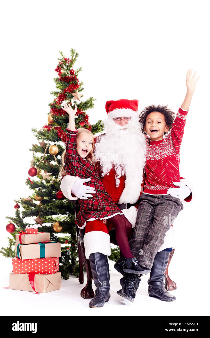 Kids with Santa Claus Stock Photo - Alamy