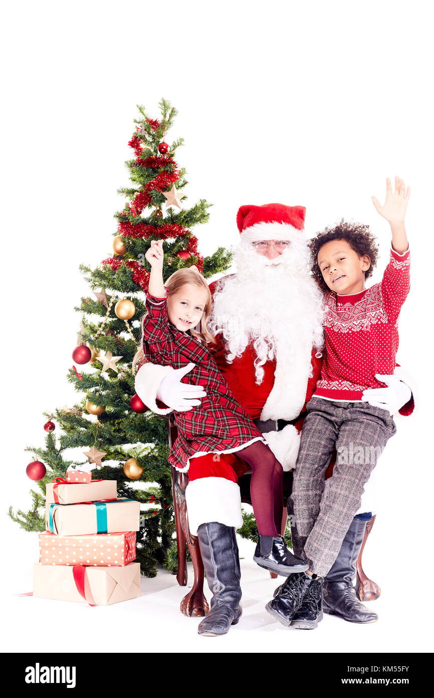 Kids with Santa Claus Stock Photo - Alamy