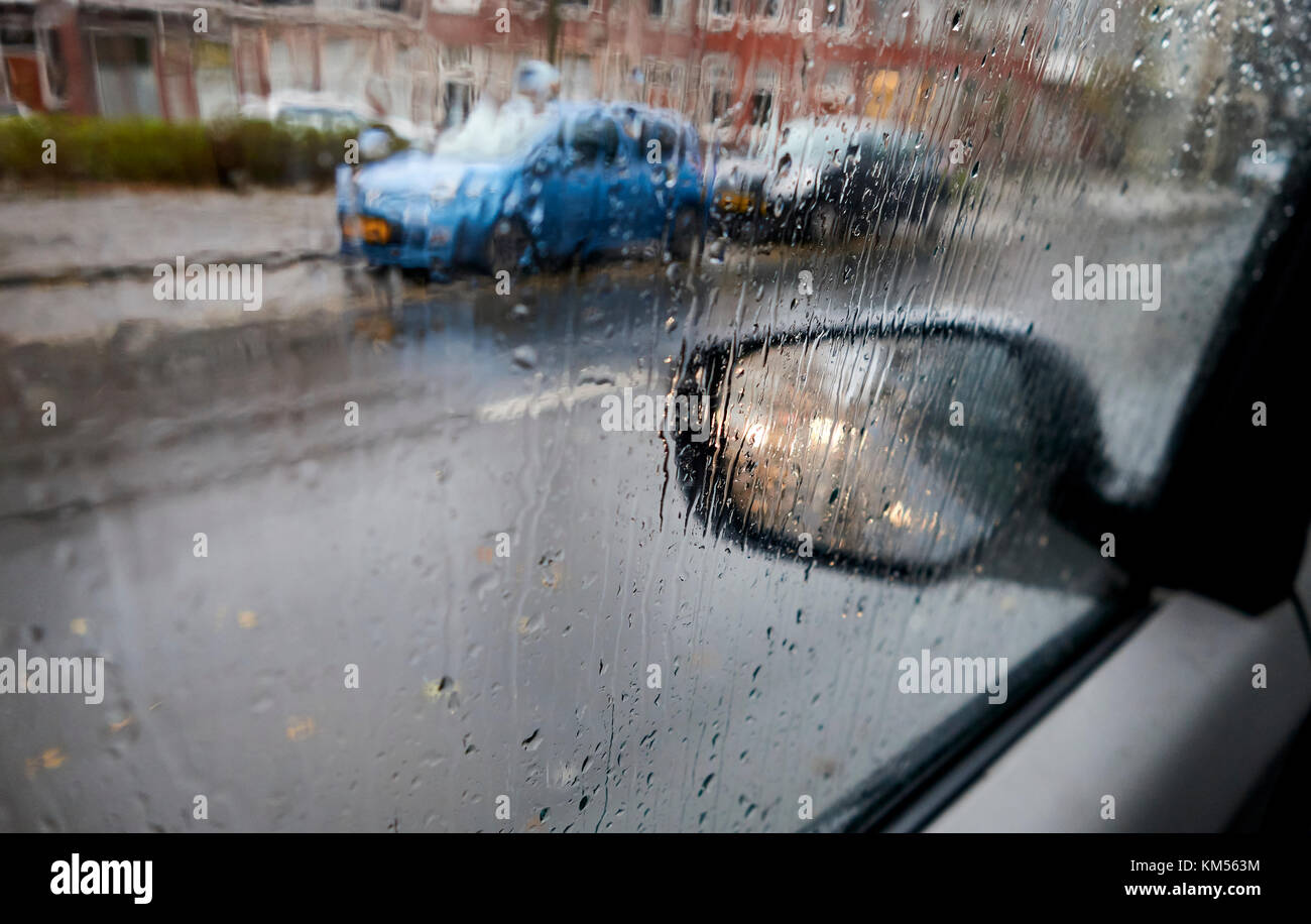 Raindrops on car in rainy hi-res stock photography and images - Alamy