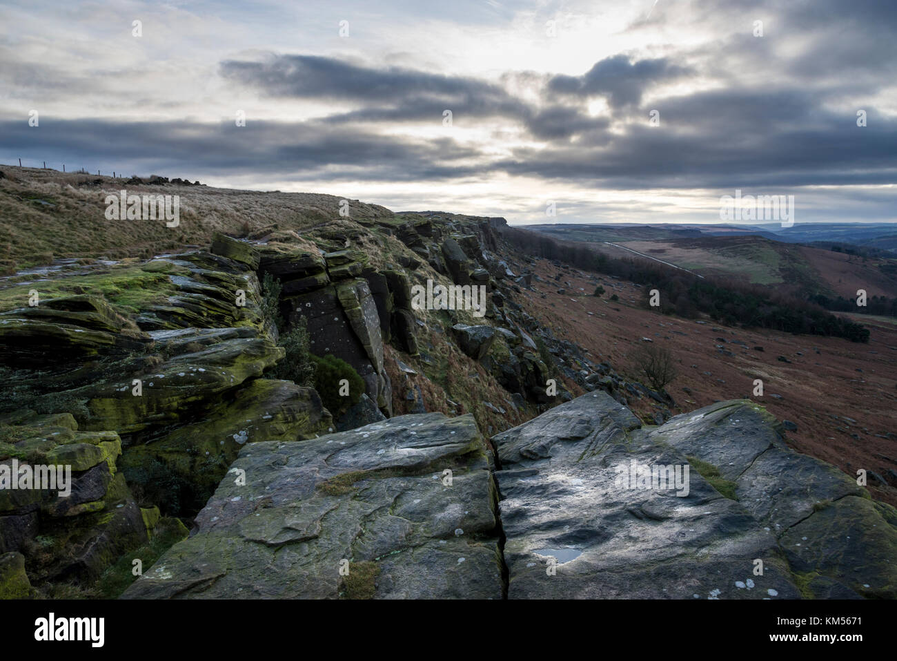 Moody winter conditions at Stanage edge in the Peak District national ...