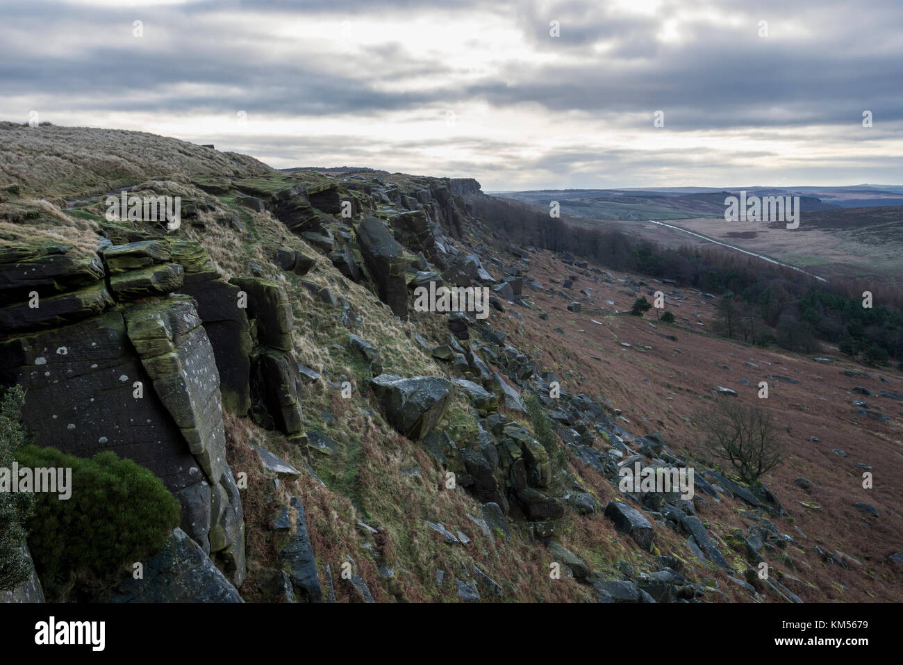 Moody winter conditions at Stanage edge in the Peak District national ...