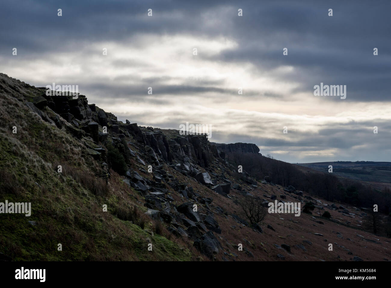 Moody winter conditions at Stanage edge in the Peak District national ...