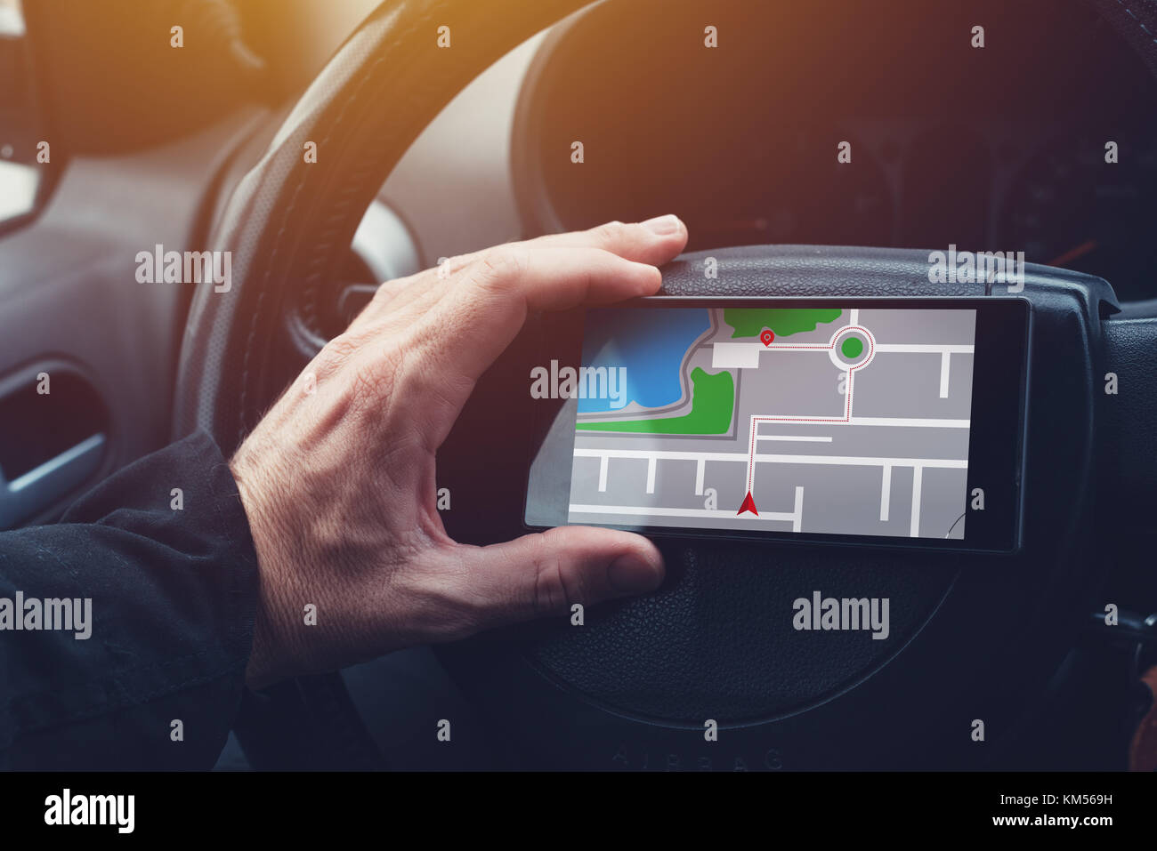 Man using compass on map hi-res stock photography and images - Alamy