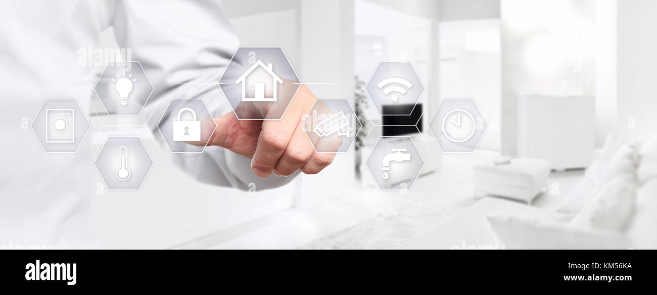 smart home automation hand touch screen with white symbols on interior ...