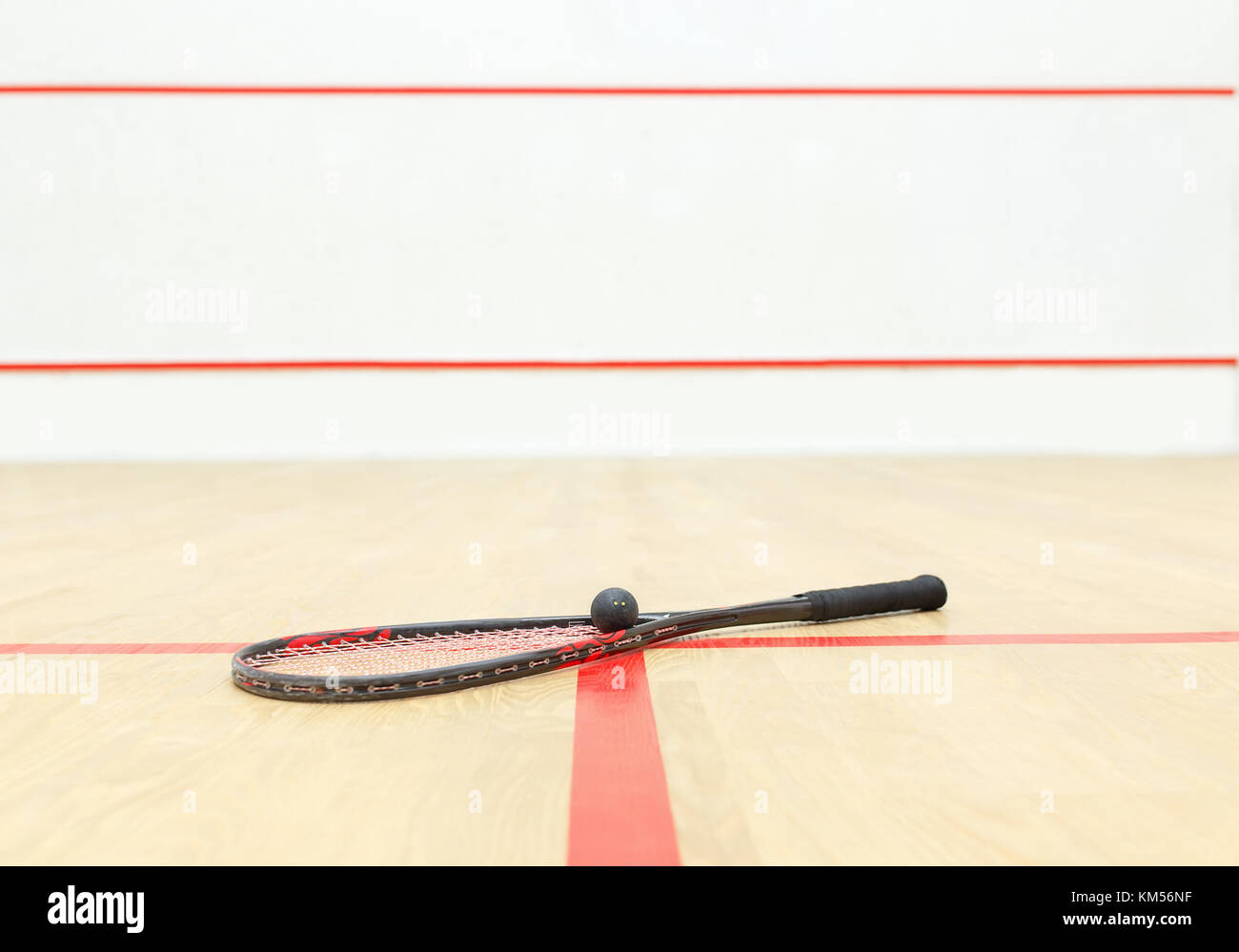 racquetball equipment and wall with red lines Stock Photo - Alamy