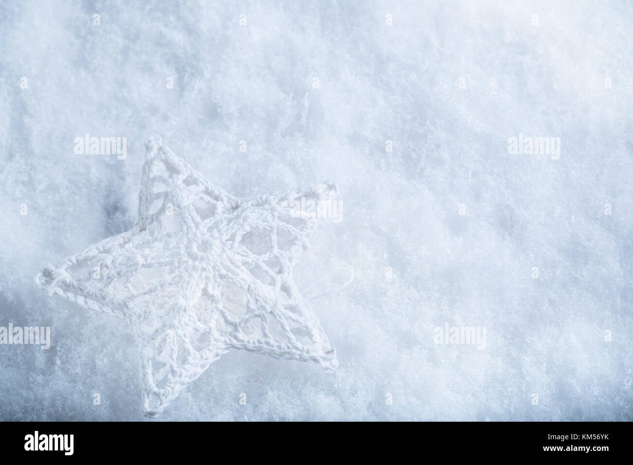 Beautiful star on a white frost snow background. Winter and Christmas ...