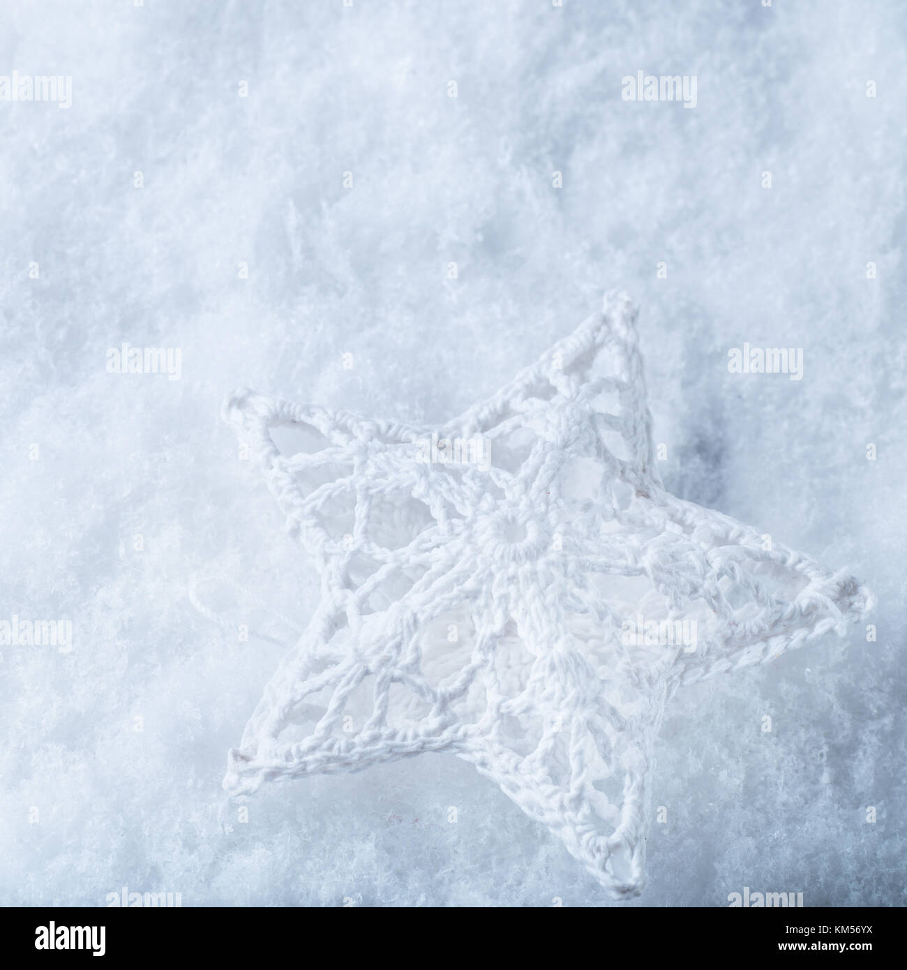 Beautiful star on a white frost snow background. Winter and Christmas ...