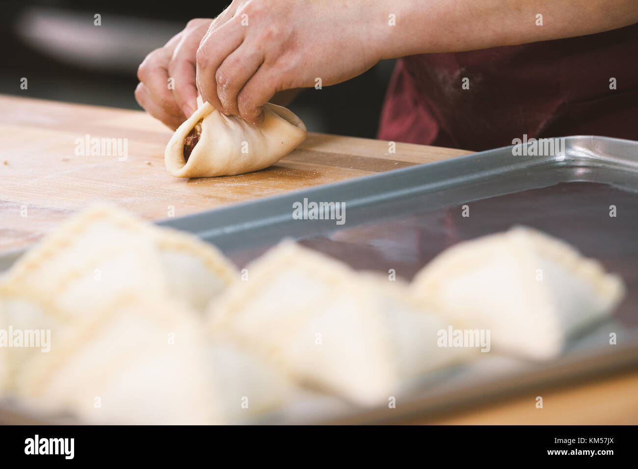 Raw meat pie on a tray Stock Photo - Alamy