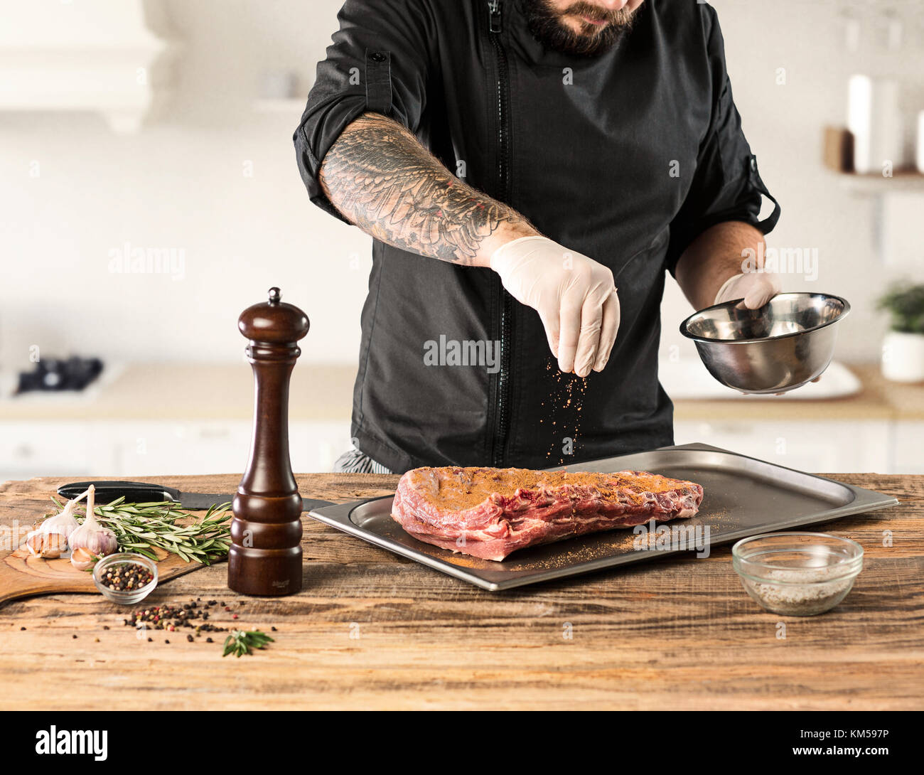 Man chef cooking beef steak hi-res stock photography and images - Alamy