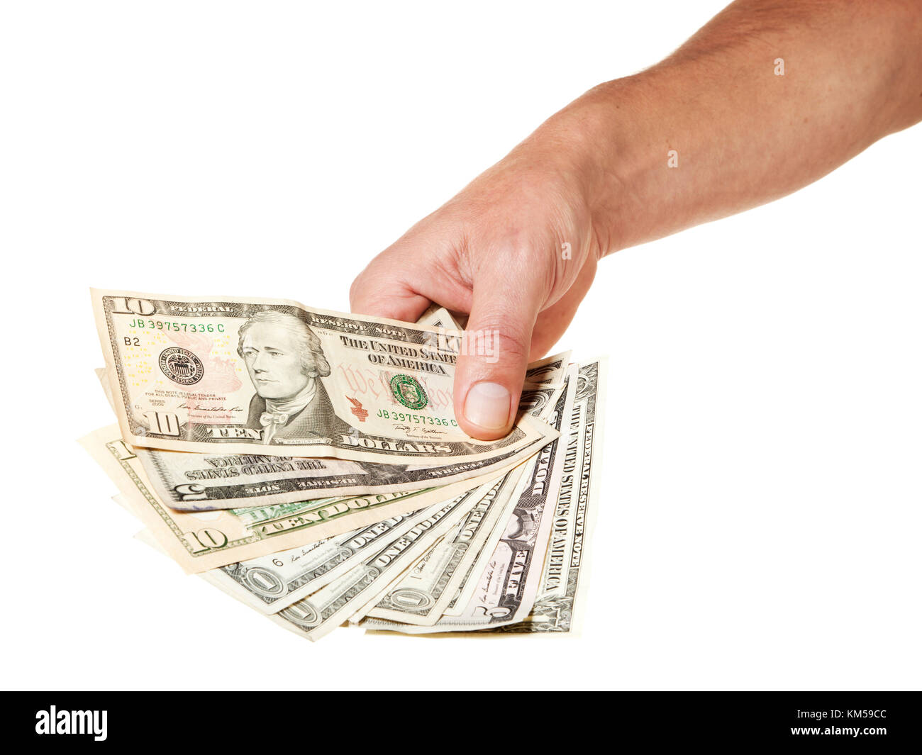 Hand holding various US dollar bills isolated on white background Stock ...