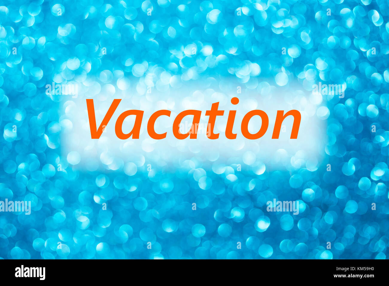 Detail of word "Vacation" on a shiny blurred blue background Stock ...