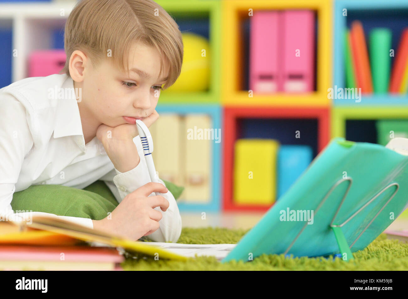 boy doing homework Stock Photo - Alamy