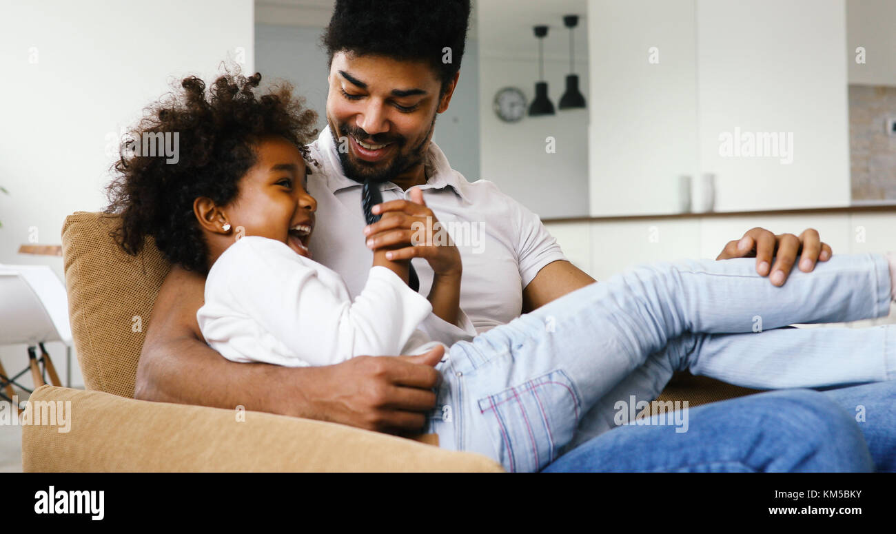 Father And Daughter Watching Television Stock Photo - Alamy