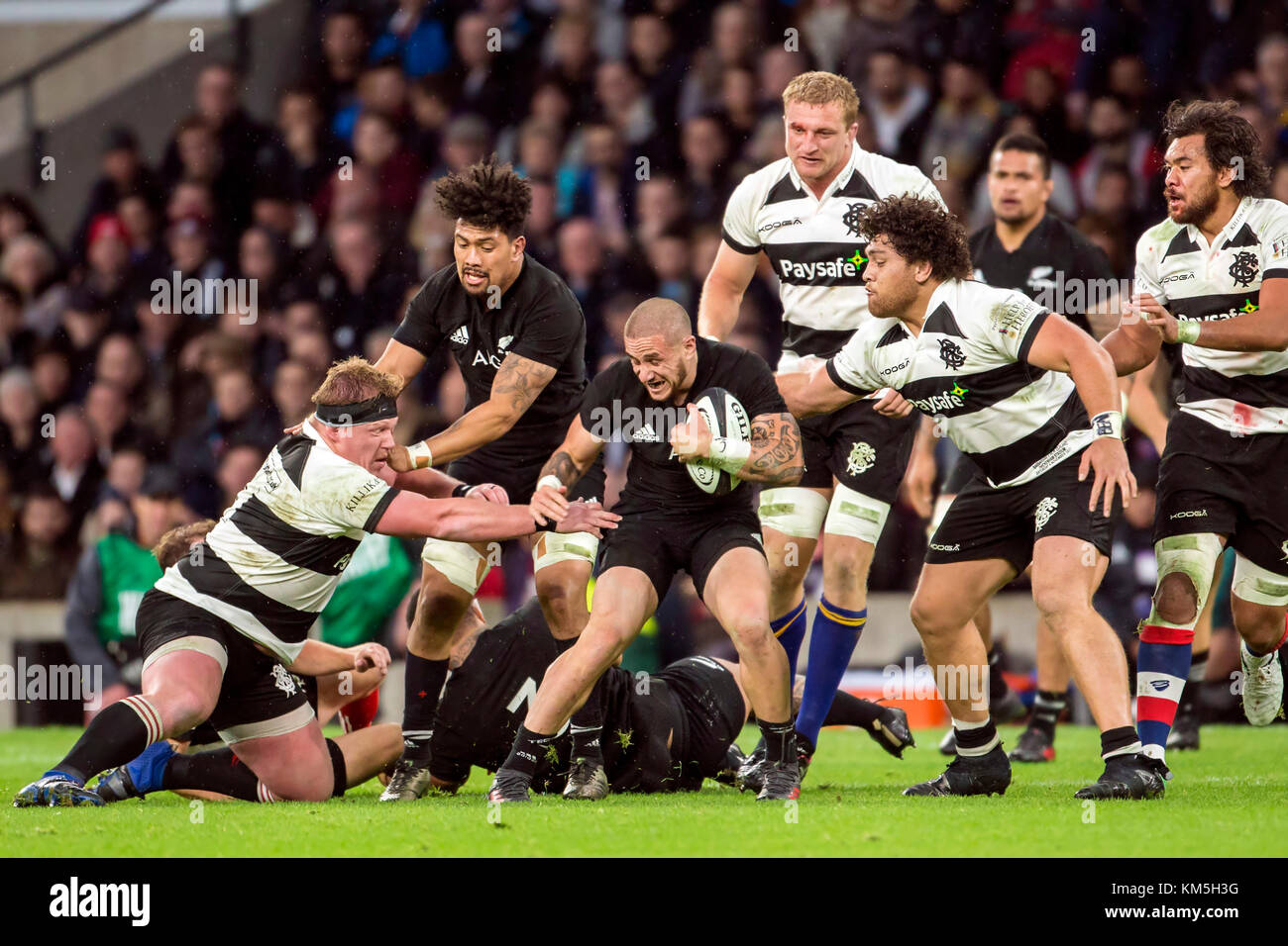 New Zealand's TJ Perenara (All Blacks, 9) attempting to defend the ball ...