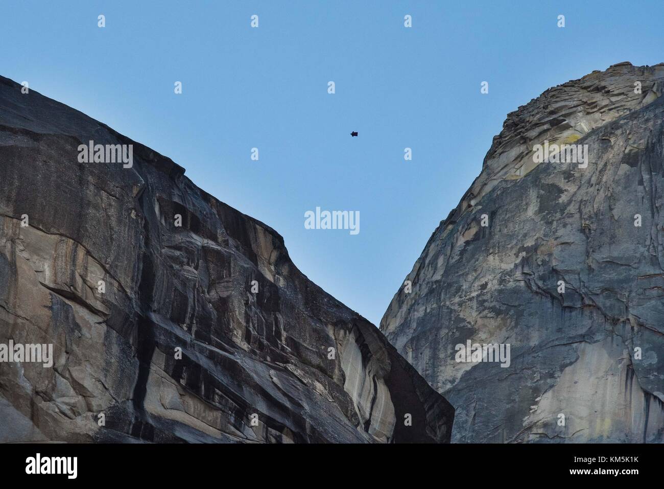 Yosemite, California, USA. 4th Dec, 2017. A wing suiter flies high ...
