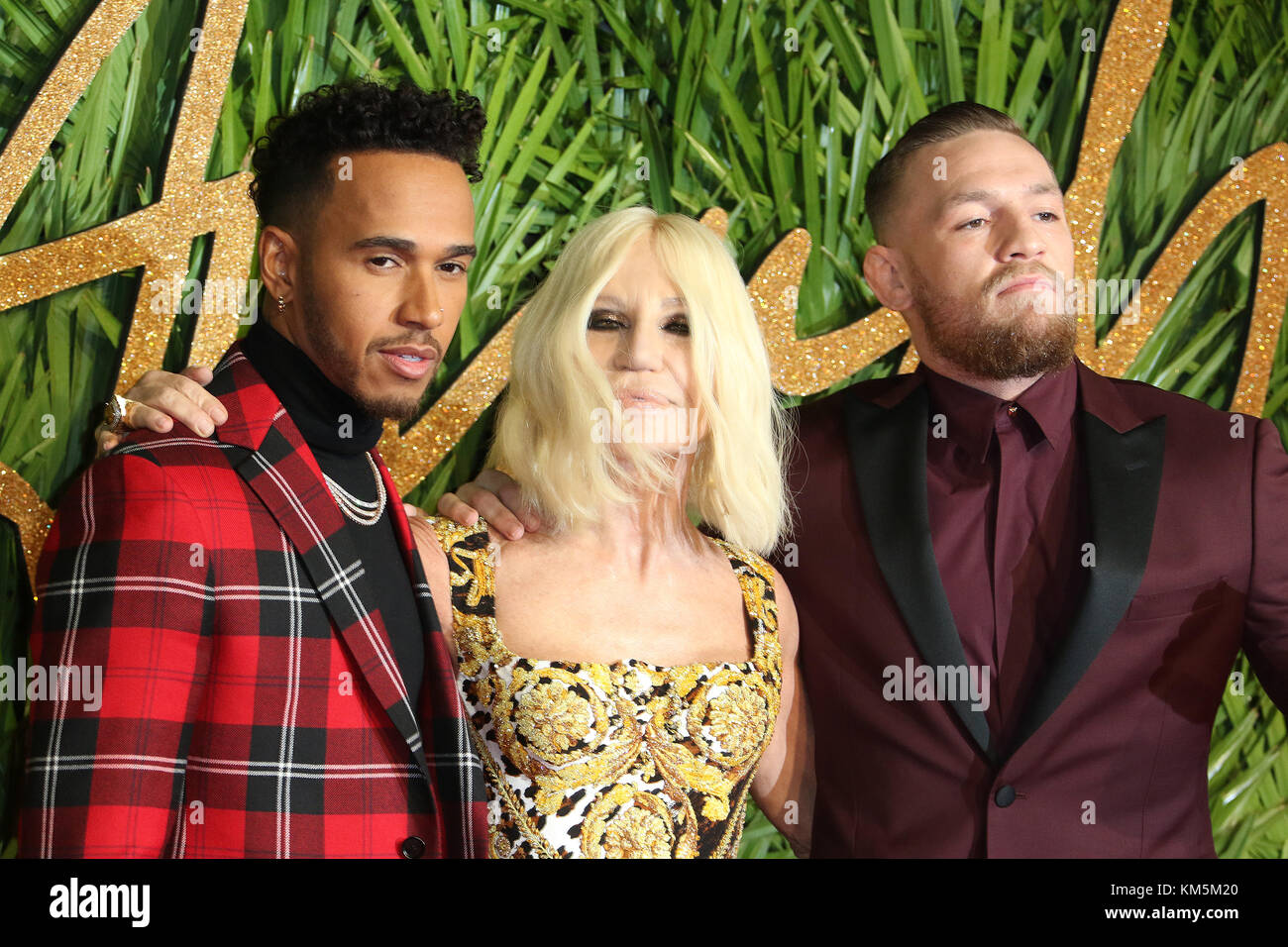 London, UK. 4th December, 2017. Lewis Hamilton, Donatella Versace ...