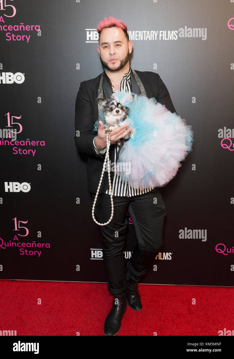 New York, NY - December 4, 2017: Roberto Negrin & dog wearing Anthony ...