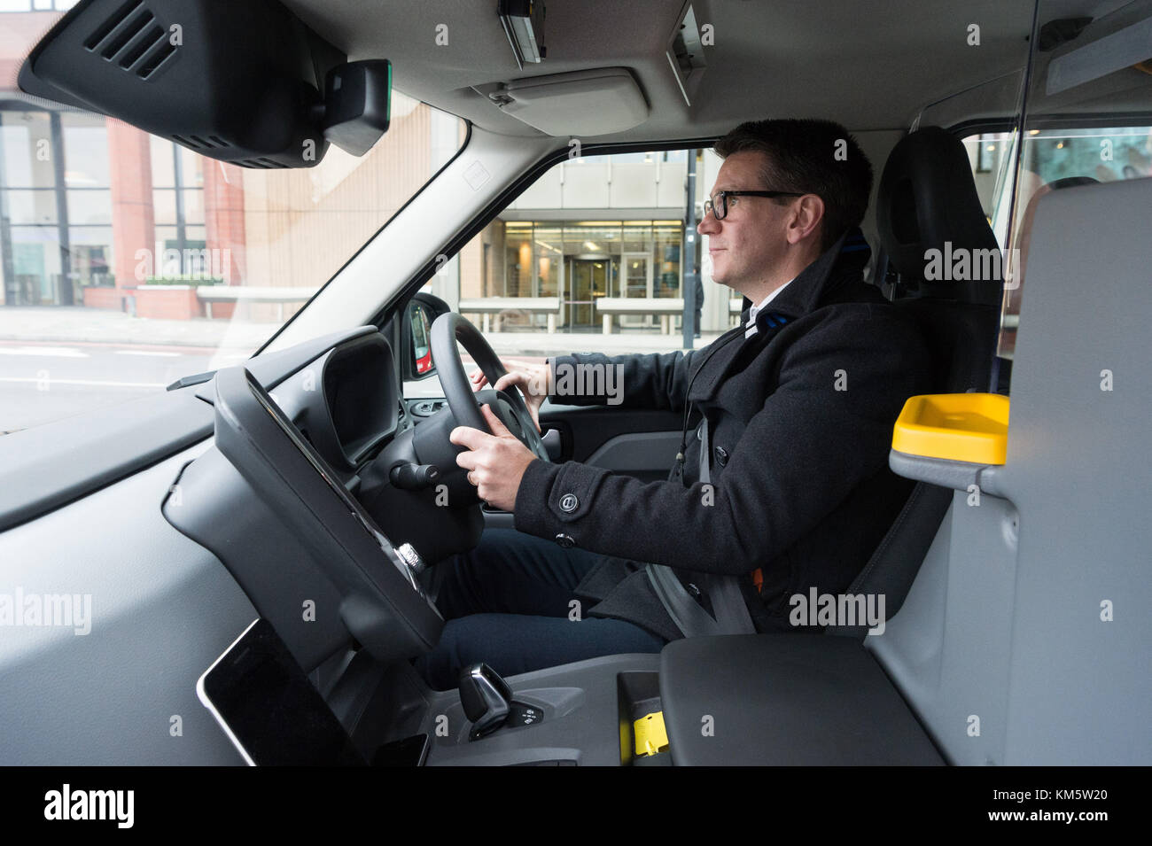 London, UK. 5th Dec, 2017. Taxi driver Peter Allen driving the new ...