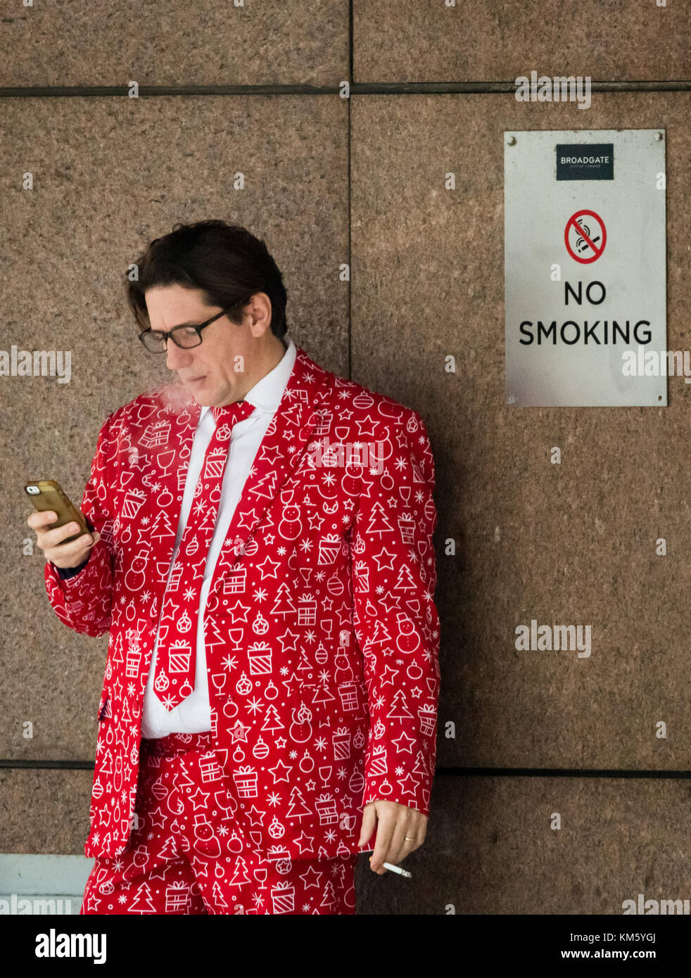 London, UK. 5th Dec, 2017. City traders arrive in fancy dress ready to ...
