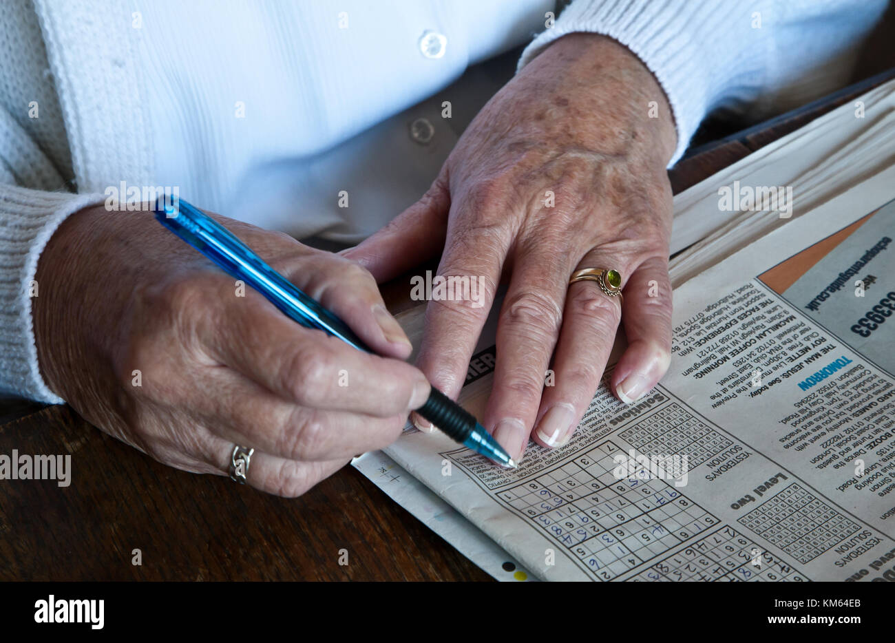Ageing hands, active mind Stock Photo - Alamy