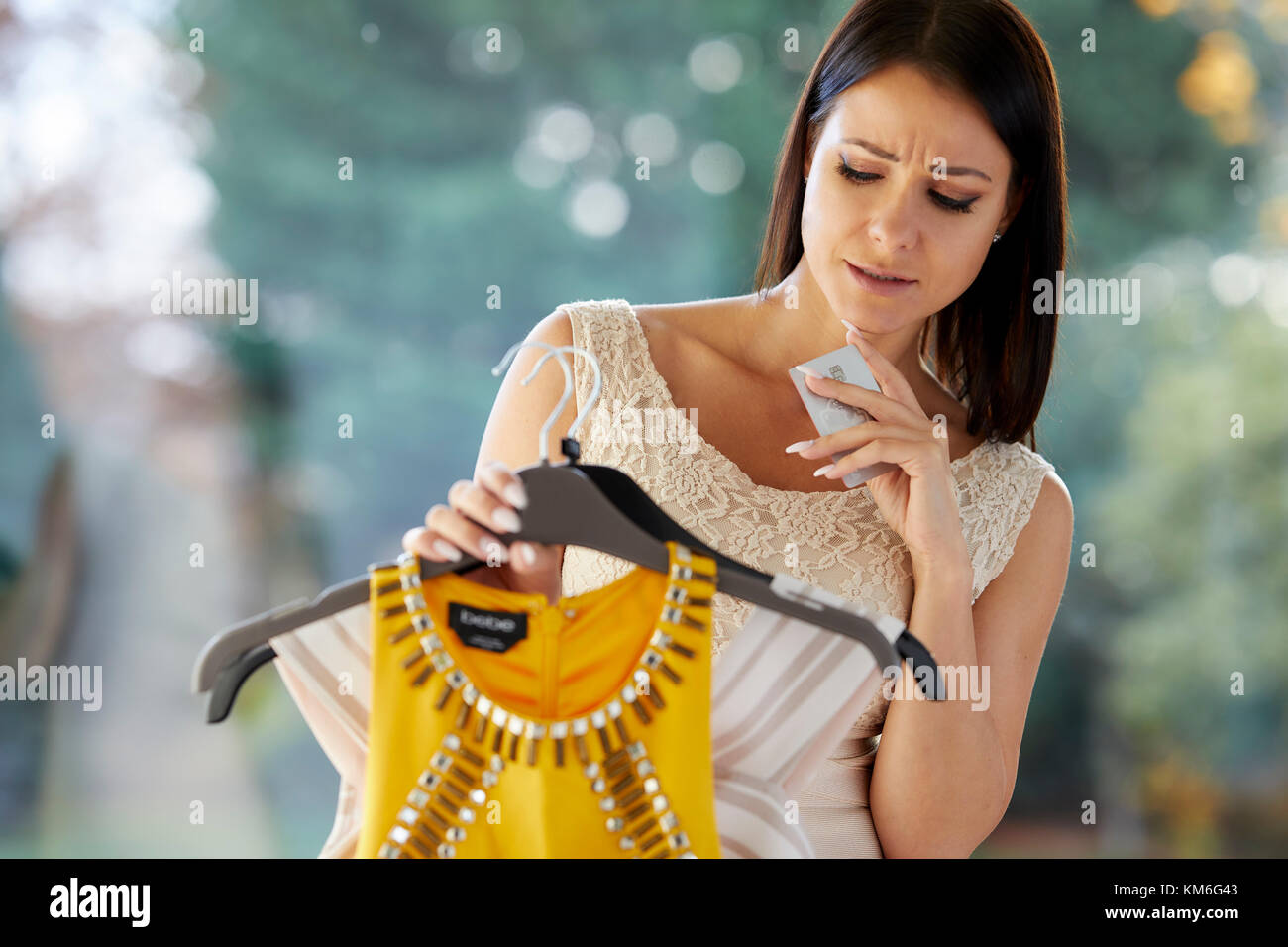Girl choosing dress hi-res stock photography and images - Alamy