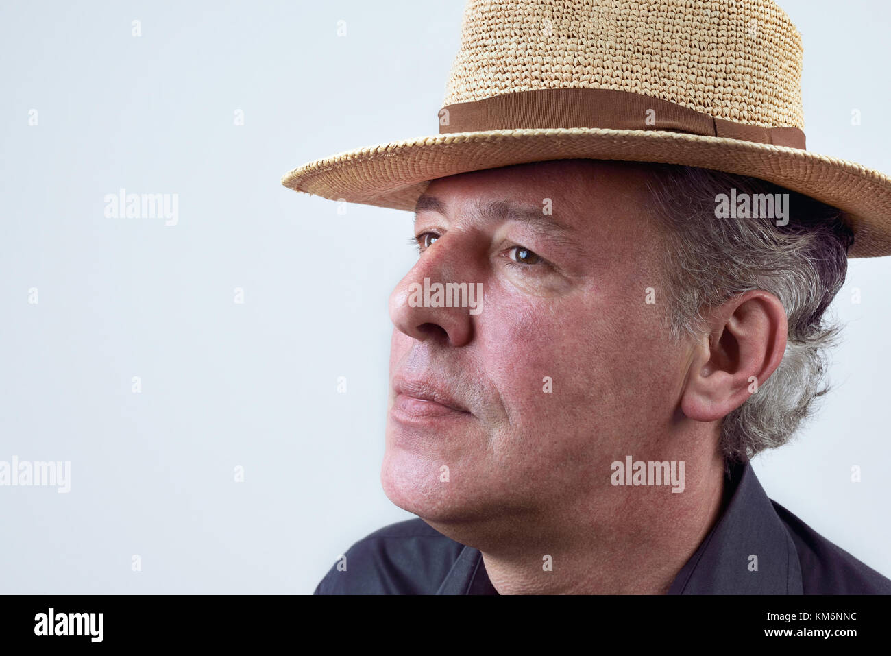Portrait of a man with gray hair in straw hat Stock Photo - Alamy