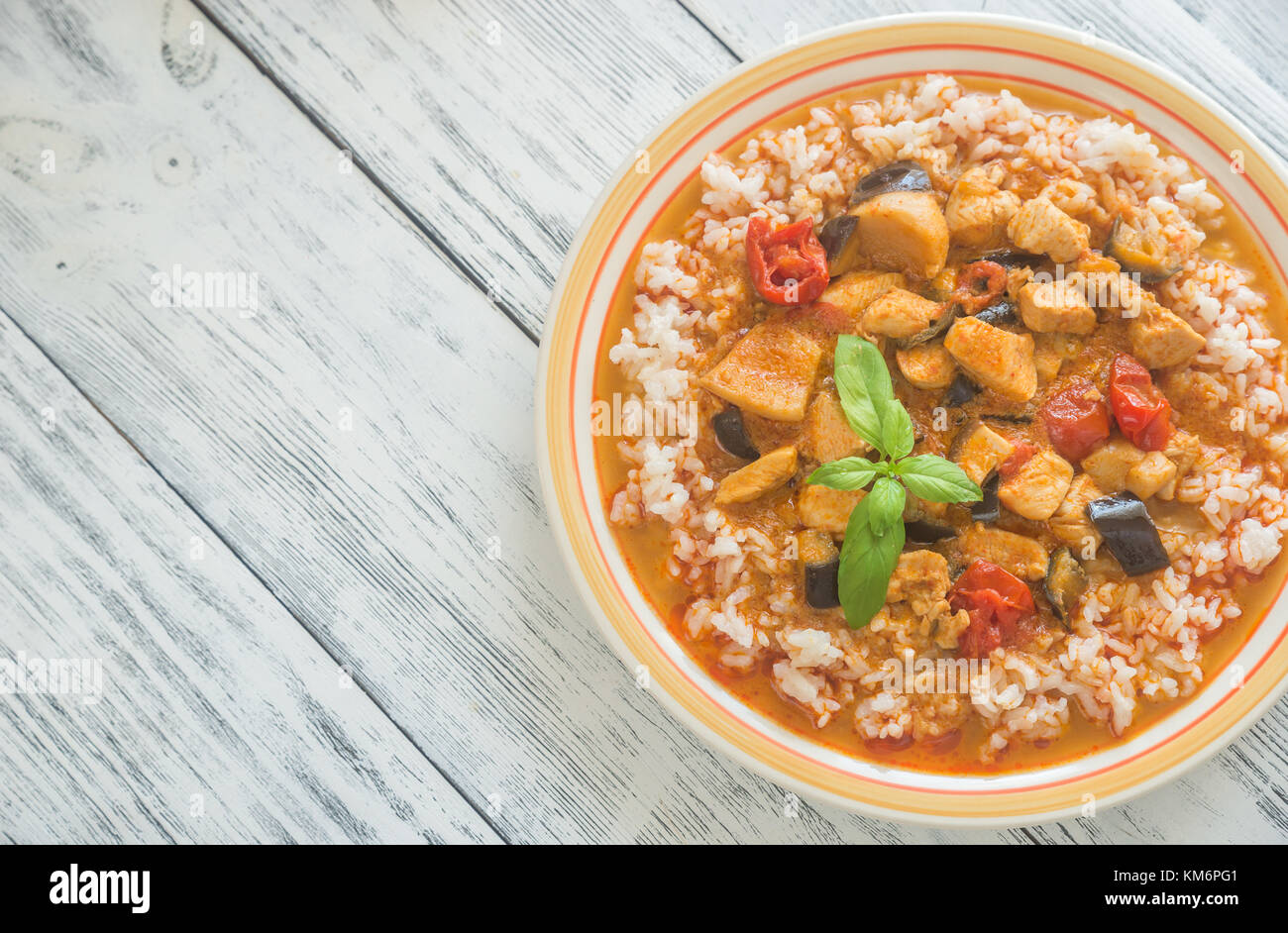 Thai red chicken curry with white rice Stock Photo - Alamy