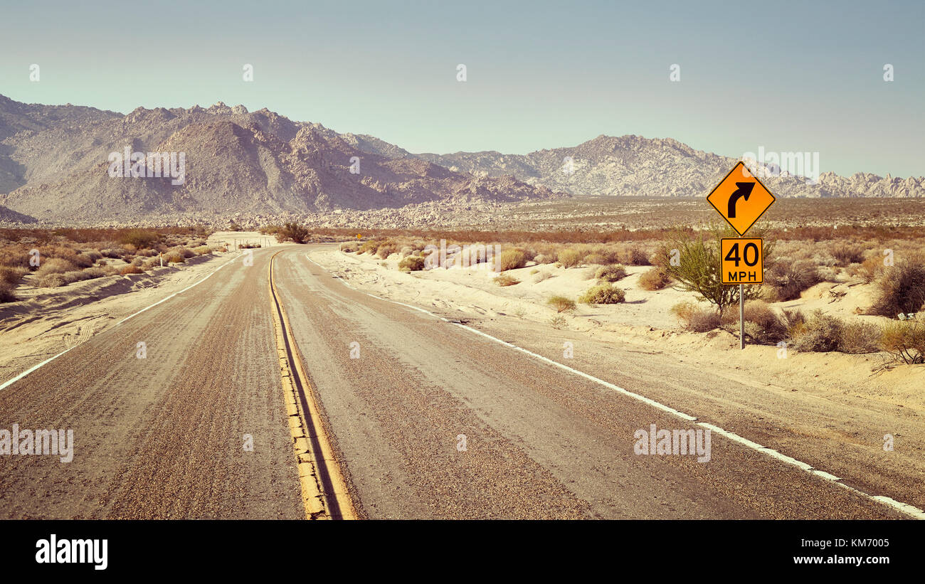 Desert highway with speed limit sign, retro stylized picture, travel ...