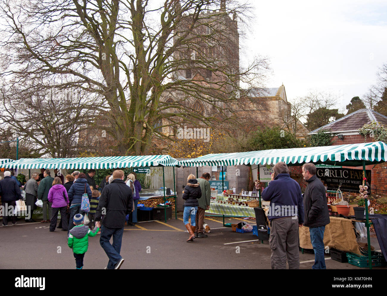 Market stalls and customers at the Farmers and Craft market outside ...