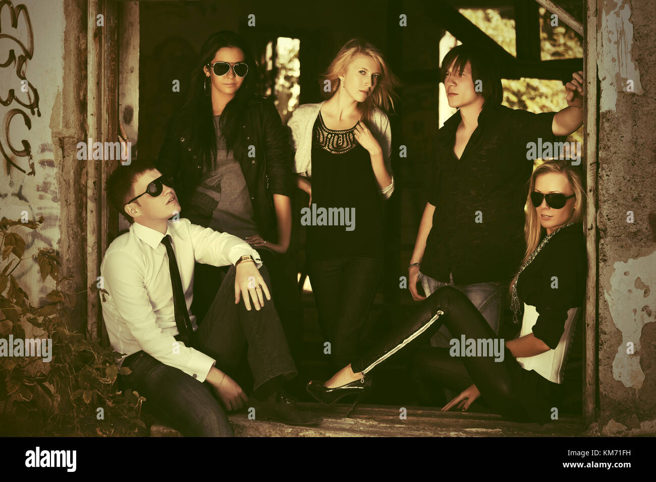 Group of young fashion men and women Stock Photo - Alamy