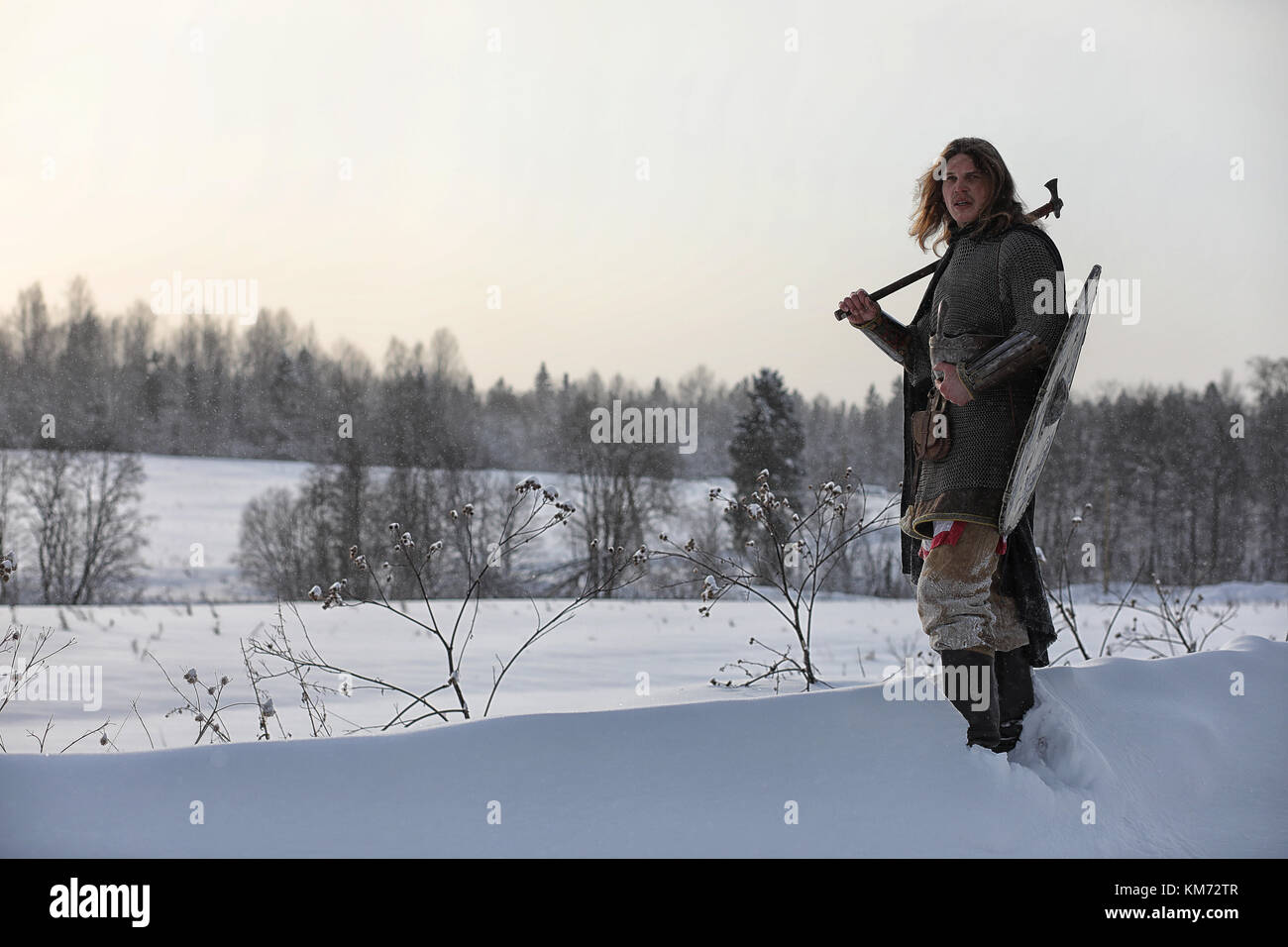 Defender the young warrior in mail armor Stock Photo - Alamy
