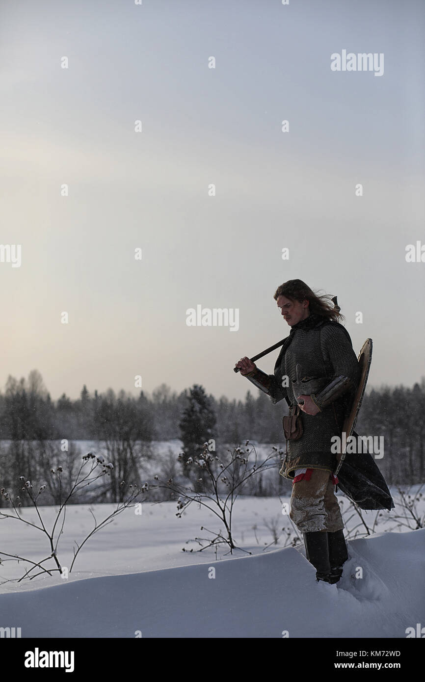 Defender the young warrior in mail armor Stock Photo - Alamy