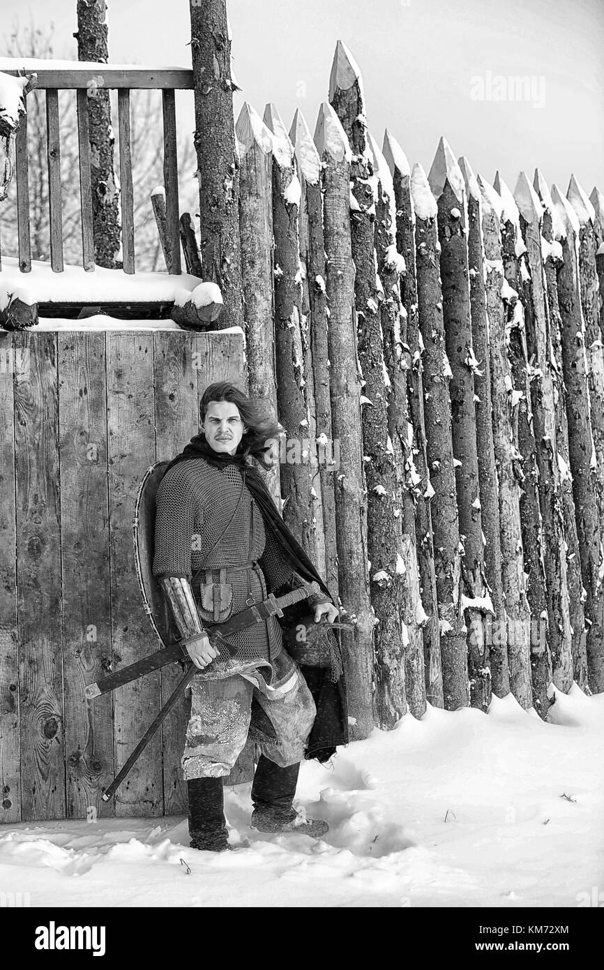 Defender the young warrior in armor Stock Photo - Alamy