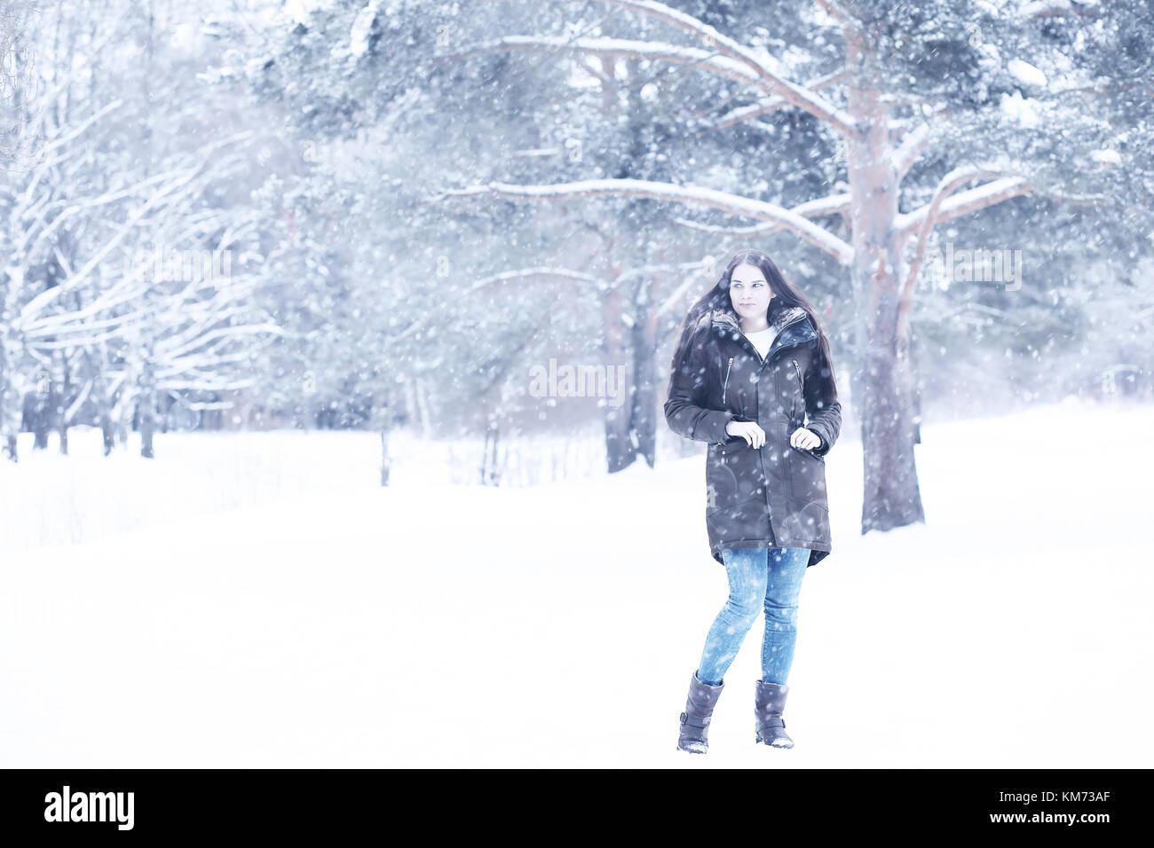 Beautiful girl in a beautiful winter snow Stock Photo - Alamy
