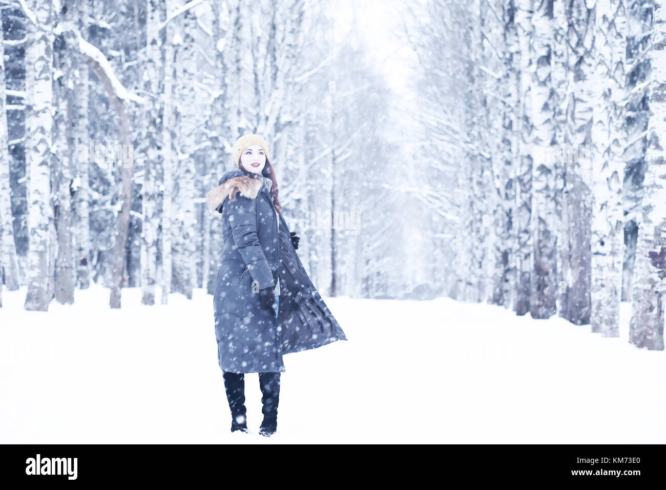 Beautiful girl in a beautiful winter snow Stock Photo - Alamy