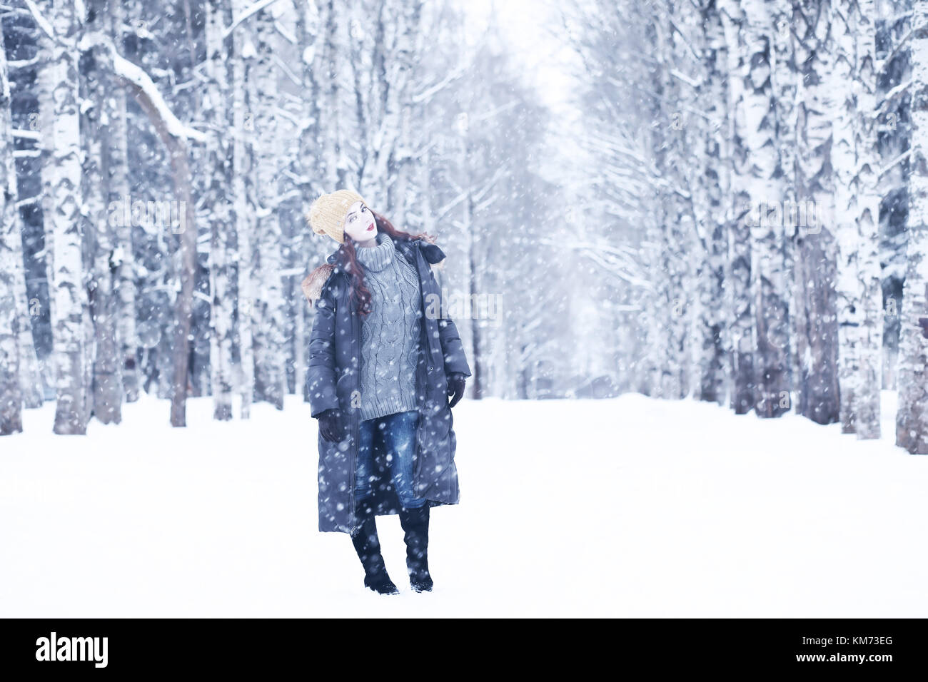 Beautiful girl in a beautiful winter snow Stock Photo - Alamy