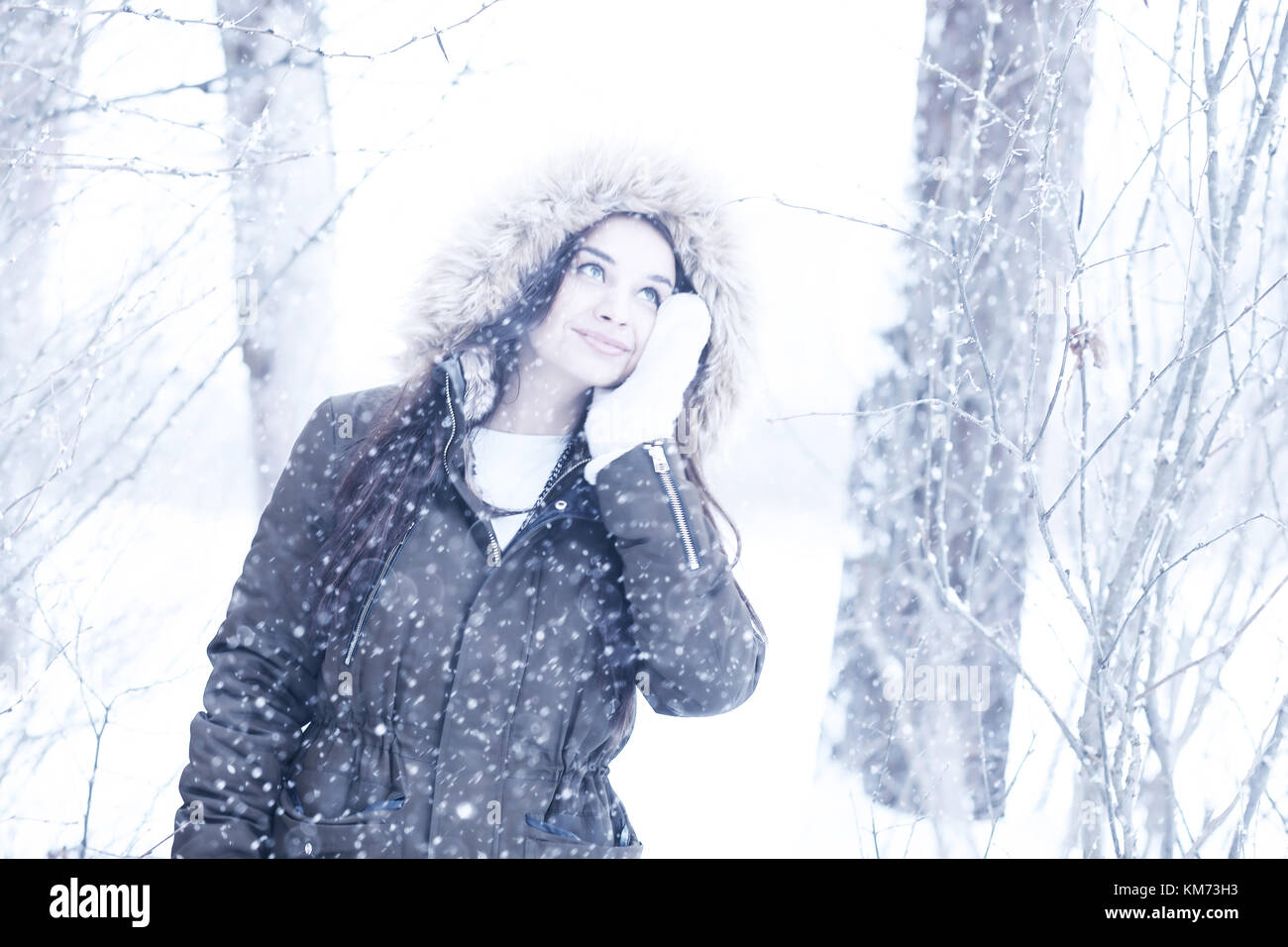 Beautiful girl in a beautiful winter snow Stock Photo - Alamy