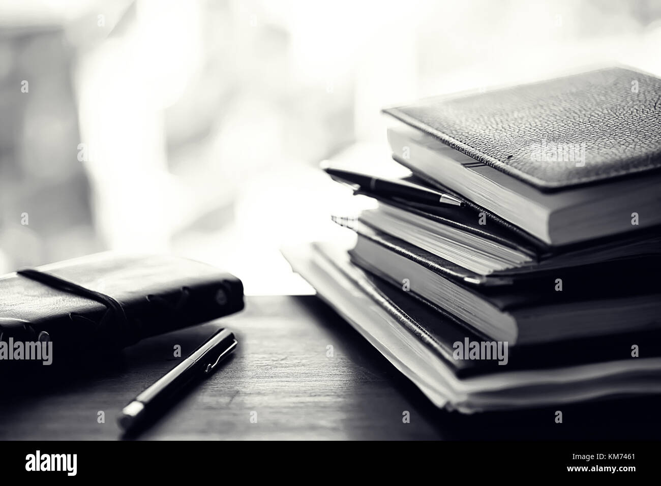 A stack of textbooks on a table Stock Photo - Alamy