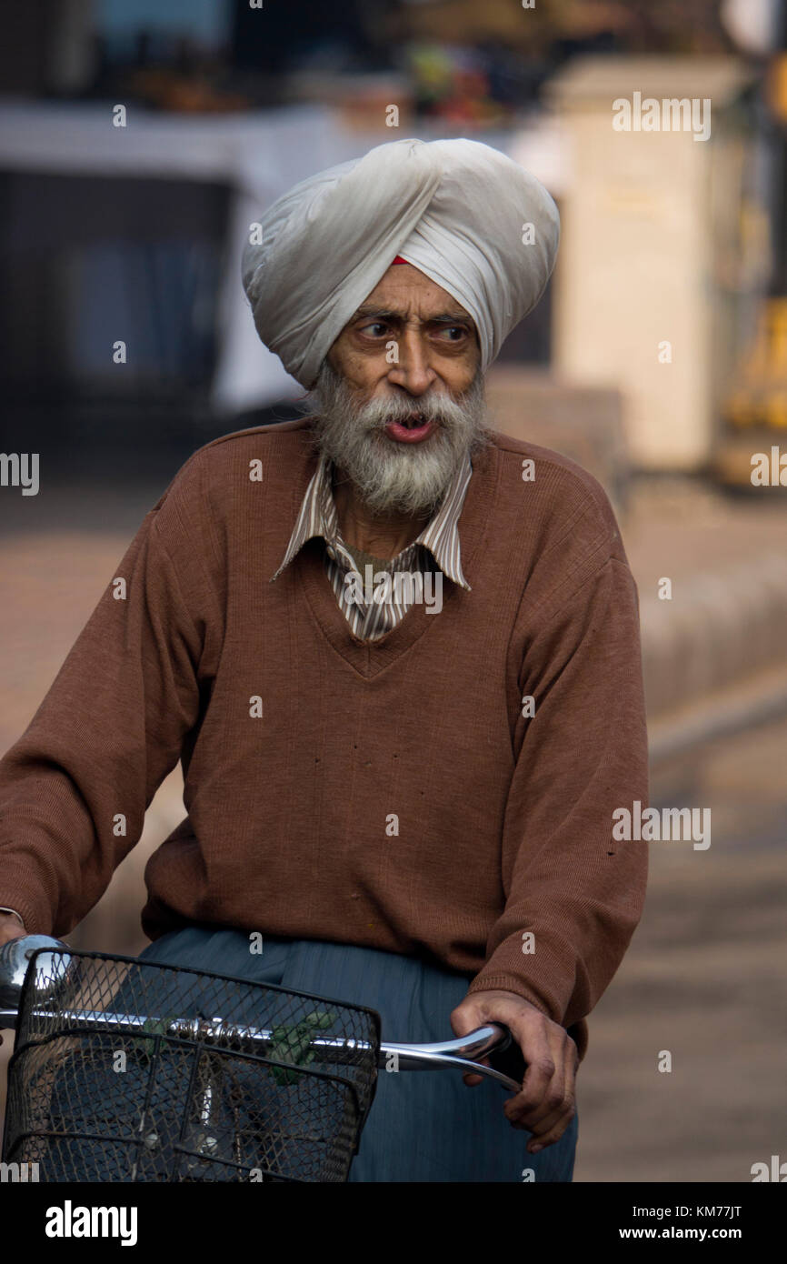 Indian man riding bicycle hi-res stock photography and images - Alamy