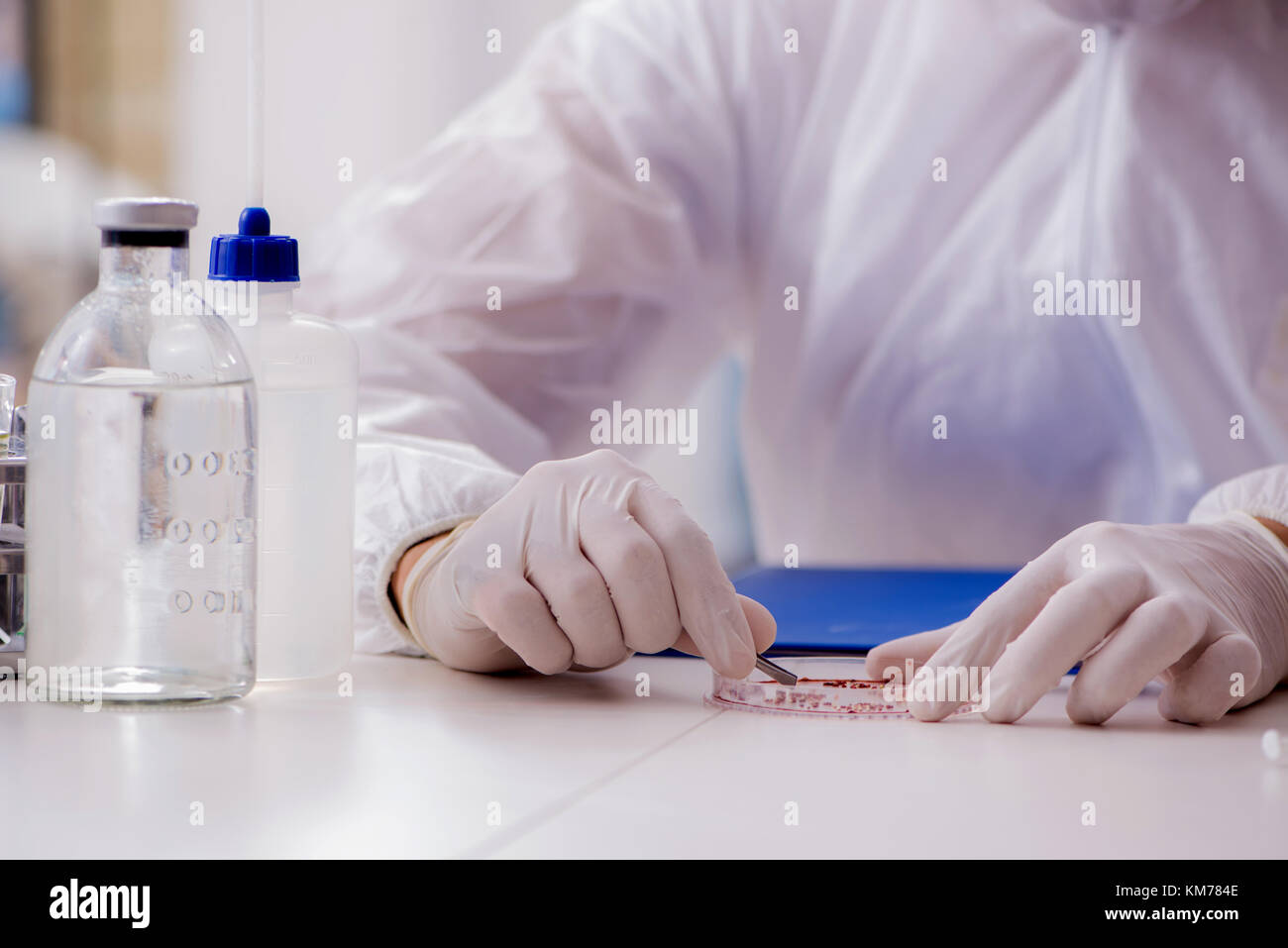 Chemist working in the laboratory with hazardous chemicals Stock Photo ...