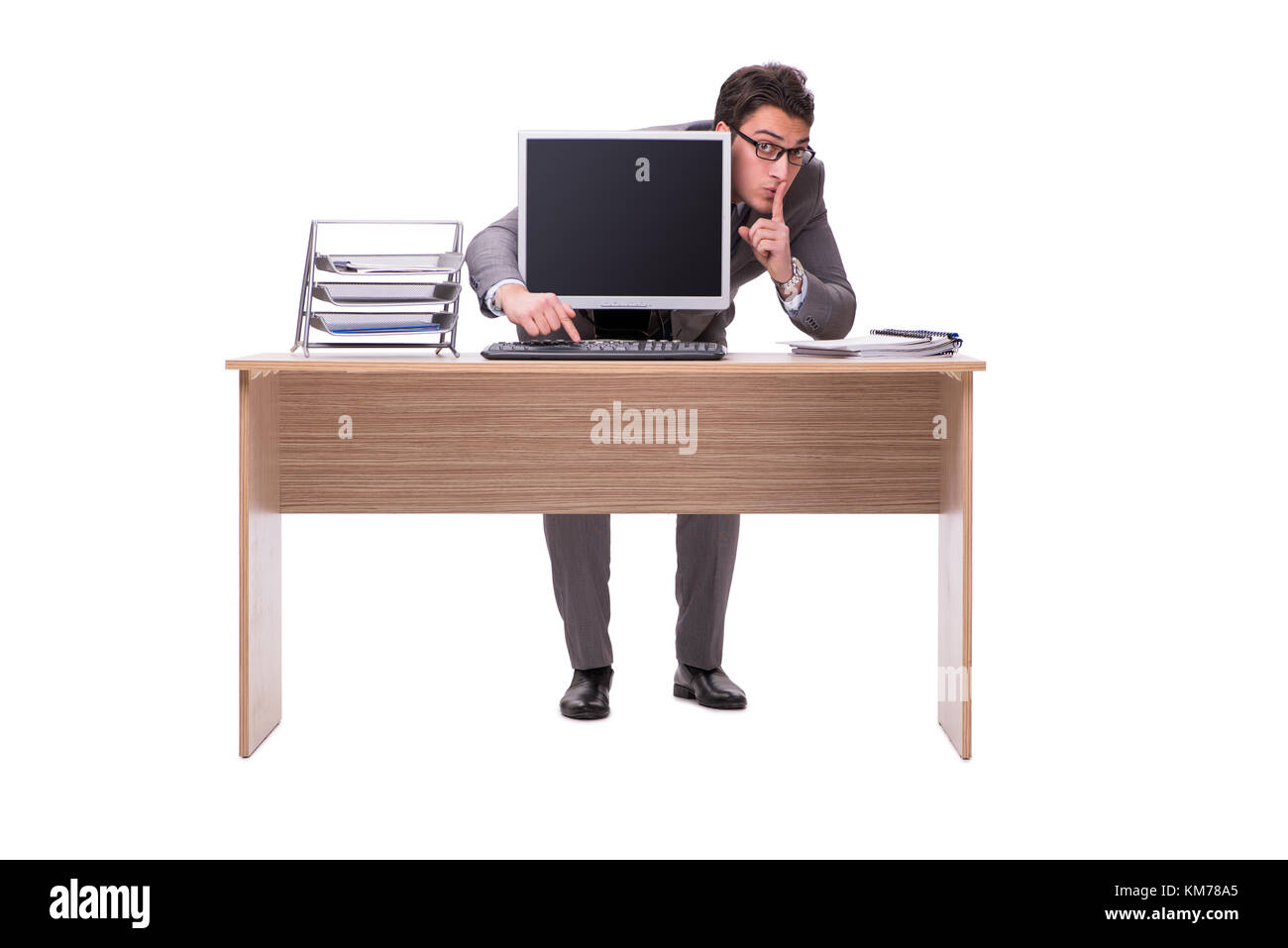 Businessman hiding in the office isolated on white Stock Photo - Alamy