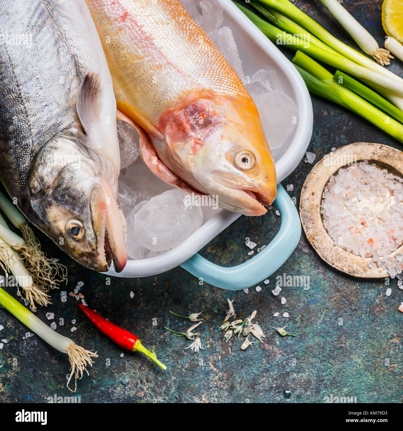 Fish food cooking ingredients with whole trout fish , top view, close ...