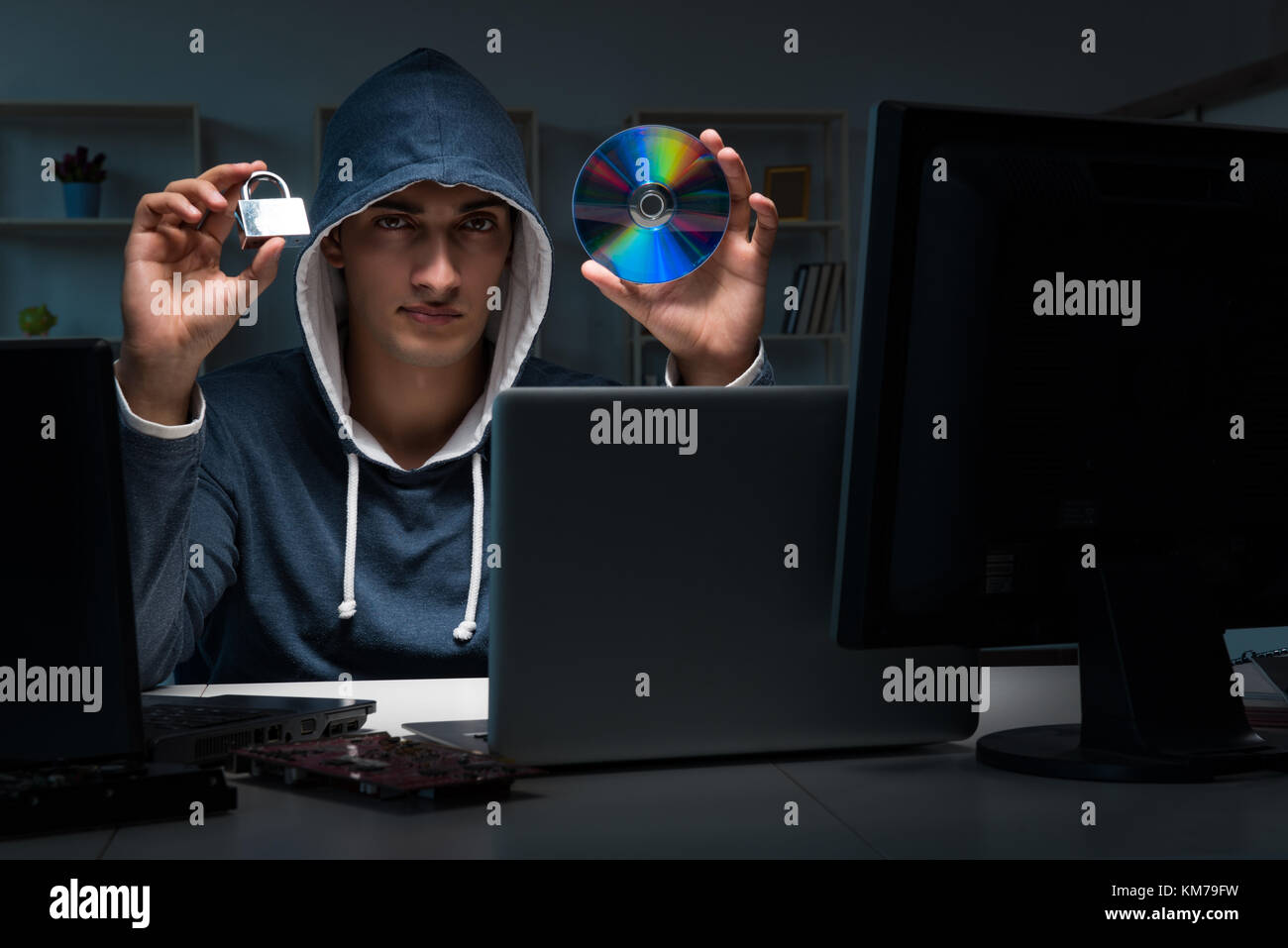 Hacker hacking computer at night Stock Photo - Alamy