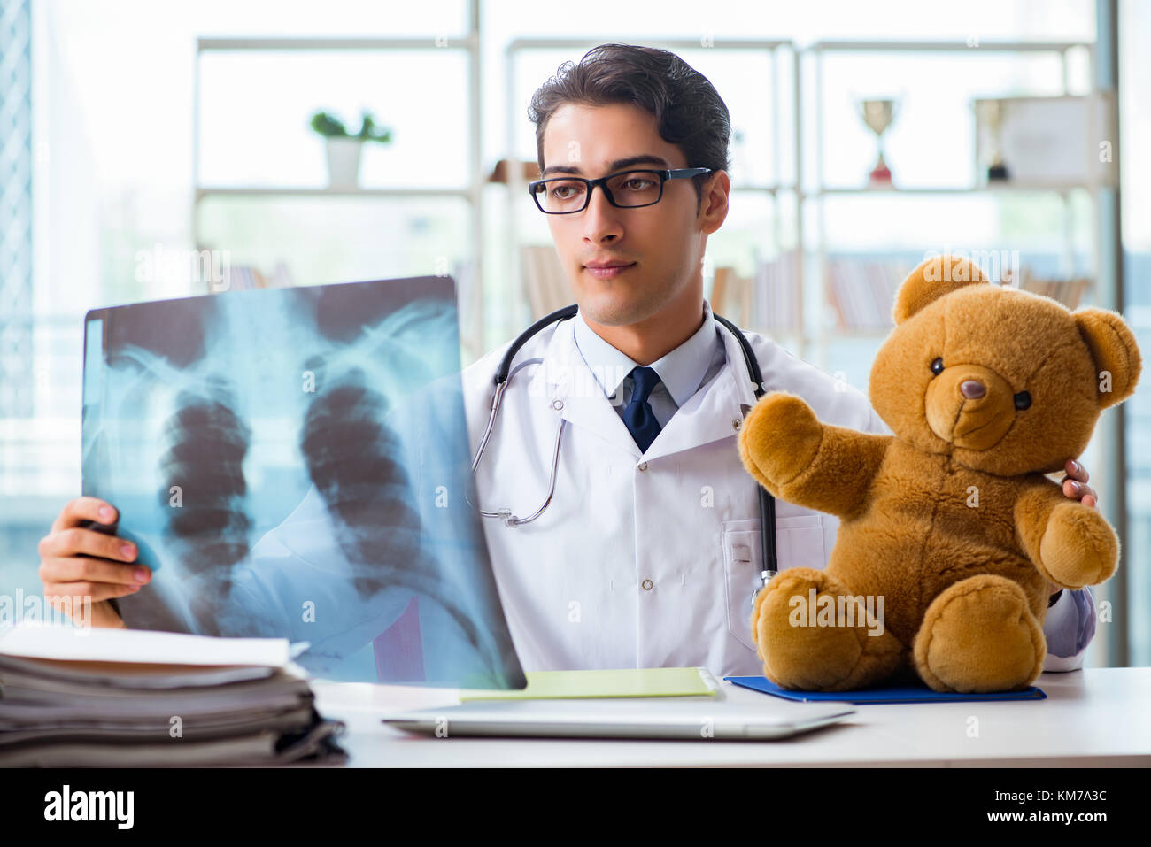 Baby radiologist with x-ray image Stock Photo - Alamy