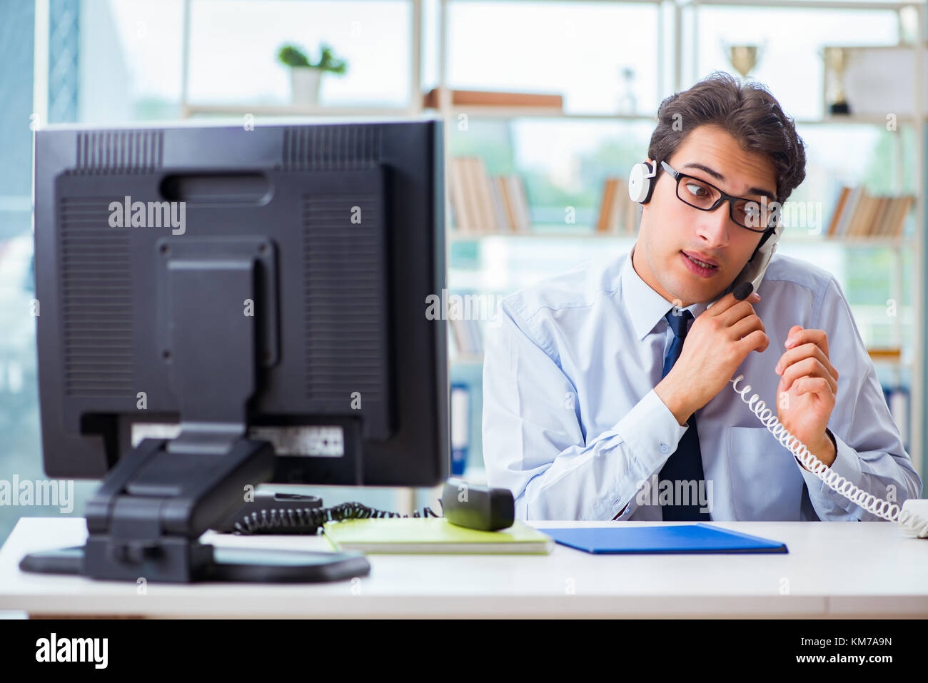 Call centre worker angry hi-res stock photography and images - Alamy