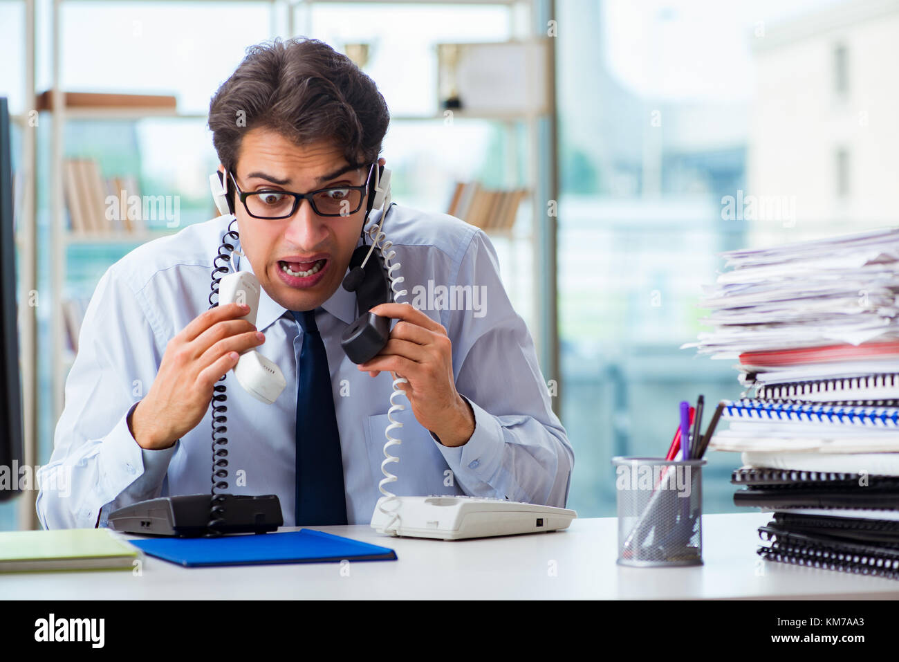 Unhappy angry call center worker frustrated with workload Stock Photo ...